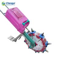 China Manual Push Fertilizer Roller Seeder 8 Nozzle Farm Corn Sowing Machine for sale