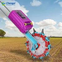 China Ergonomic Walk Behind Hand Push Fertilizer Spreader 14kg Manual Sowing Machine for sale