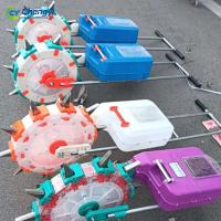 China Ergonomic Walk Behind Hand Push Fertilizer Spreader 14kg Manual Sowing Machine for sale