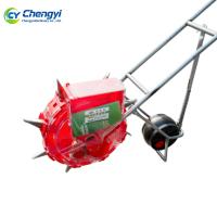 China Iron Manual Seeder Machine Push Planter Efficient Seed Sowing Equipment for Agriculture for sale