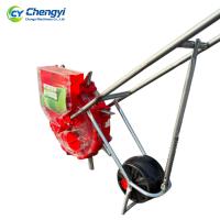 China Iron Manual Seeder Machine 7kg Seed Box Hand Seeder for Efficient Agricultural Sowing for sale