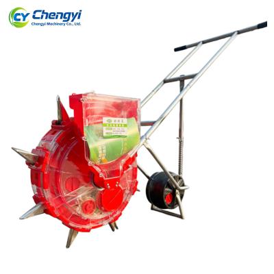 China Iron Manual Seeder Machine 7kg Seed Box Hand Seeder for Efficient Agricultural Sowing for sale
