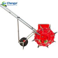 China Steel Manual Seeder Machine Push Seeder 7kg Seed Box Capacity 20cm Roller Diameter for sale