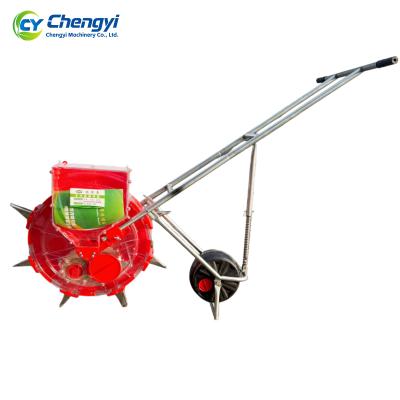 China Reinforced Metal Hand Push Seeder 7kg Seed Box Capacity Adjustable Seeding for Farmland Garden for sale