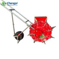 China Iron Manual Seeder Machine Push Planter Efficient Seed Sowing Equipment for Agriculture for sale