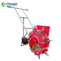 China Heavy Duty Steel Hand Push Seeder 7kg Capacity Manual Sower for Farm Garden for sale