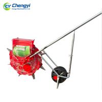 China Steel Manual Seeder Machine Hand Push Planter 7kg Seed Box Adjustable Spacing for sale