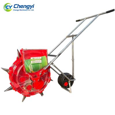 China High Strength Plastic Hand Push Seeder Planter 7kg Capacity Lightweight Accurate Seeding for Field Gardening for sale
