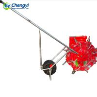 China Reinforced Metal Hand Push Seeder 7kg Seed Box Capacity Adjustable Seeding for Farmland Garden for sale