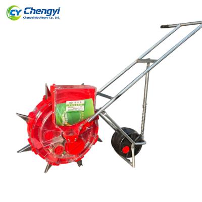 China Wear-Resistant Hand Push Seeder Planter 7kg Seed Box Labor-Saving Sowing Tool for sale