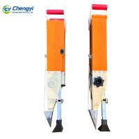 China Iron Manual Seeder Machine Hand Operated Planter 4kg Capacity 81cm Height Durable Seed Sowing Farming Equipment for sale