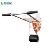 China Stainless Steel Manual Seeder Machine with Fertilizing 14.5kg Portable Farm Planter for sale