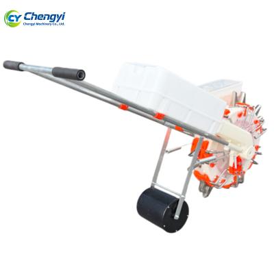 China Stainless Steel Manual Seeder Machine with Fertilizing 14.5kg Portable Farm Planter for sale