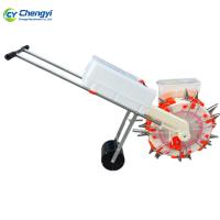 China Manual Seeder Machine with Fertilizing Precision Row Dropper 14.5kg Carbon Steel for sale