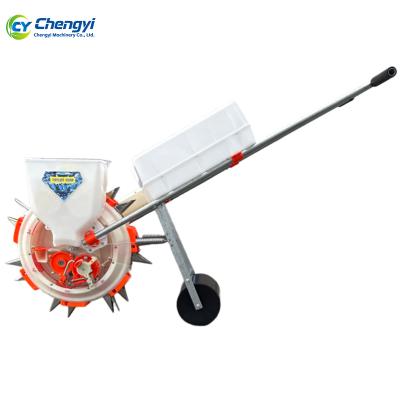China Iron Manual Seeder Machine With Fertilizing Efficient Agricultural Sowing Tool For Crops for sale