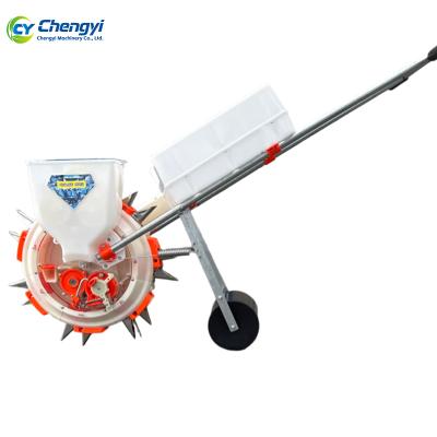 China Polymer Manual Seeder Machine With Fertilizing Hand Operated Sower Lightweight Distribution Unit for sale