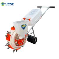 China Manual Seeder Machine with Fertilizing Hand Push Planter 14.5kg Dual Function Crop Sowing Tool for sale