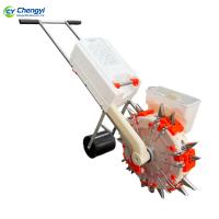 China Heavy Duty Manual Seeder Machine 14.5kg Portable Row Sower with Fertilizer for sale