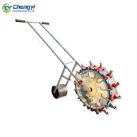 China Manual Seeder Machine Hand Planter 7kg Seed Box Multi Crop Planting Tool for sale