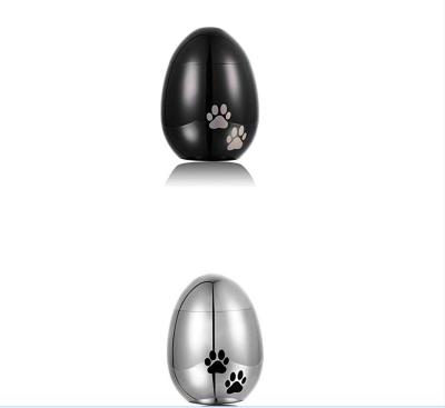 China Chic Egg Shape Mini Cremation Urn For Pet Animal Ashes Dog Paw Print Silver Gold Rose Gold Black Urn For Ashes Pendant Free Engrave for sale