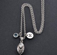 China Leaf-shaped Cremation Jewelry Necklace with Chrysanthemum Engraving and Birthstone OEM/ODM for sale