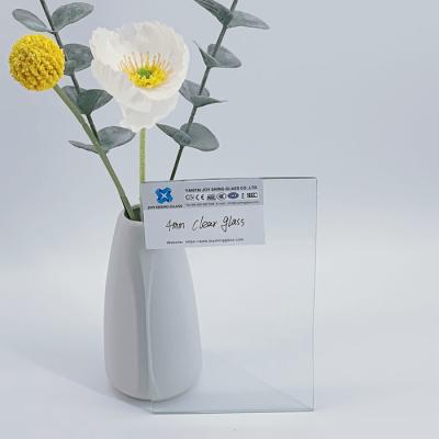 China Clear Float Glass 2mm to 22mm Thickness with 90.69% Light Transmittance for Construction and Electronics for sale