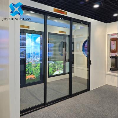 China Horizontal Sliding UPVC Double Glazed Door - Custom Sizes 6mm-12mm Glass with Thermal Insulation for sale