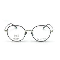 China TD055 Stylish Round Titanium Frame Glasses for Women - Durable and Lightweight for sale