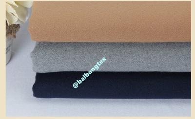 China 100% polyester melton woolen fabric warm for winter stock lots for sale