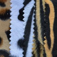 China Tricot Velboa print flocking fabric zebra print plush flock fabric wholesale best quality for sale