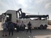 China 50 Ton Rotator Wrecker 8x4 5 Stage Boom H Shape Outriggers Heavy Duty Tow Truck for sale