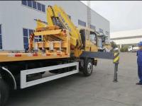 China 5 Tons HOWO Euro 3 Euro 5 Flatbed Wrecker Truck with 4 Tons Knuckle Crane for sale