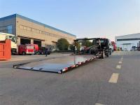 China Isuzu 130hp Roll Off Deck Carrier Flatbed Wrecker Truck 5 Tons for sale