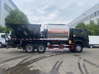 China Sinotruck Howo 38000kg GVW Synchronous Chip Sealer Truck 8000L Asphalt 12000L Gravel for sale