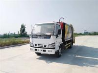China ISUZU 600P 4x2 6000 Liters Left Hand Drive Garbage Compactor Truck Euro 5 for sale