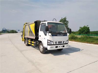 China ISUZU 600P 4x2 6000 Liters Left Hand Drive Garbage Compactor Truck Euro 5 for sale