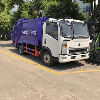 China 4x2 Euro 3 HOWO 8cbm Waste Compactor Truck RHD LHD Garbage Collection Vehicle for sale