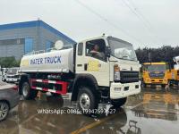 China SINOTRUK HOWO 10 Ton Water Tank Truck with Water Cannon Pump 10000L for sale