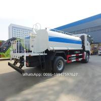 China ISUZU FTR 4x2 Left Hand Drive Water Tank Truck 12000L Water Sprinkler for Road Cleaning for sale