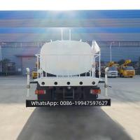 China ISUZU FTR 4x2 Left Hand Drive Water Tank Truck 12000L Water Sprinkler for Road Cleaning for sale