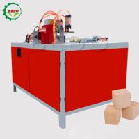 China Automatic Wood Building Block Cutter Foot Pier Machine Sawdust Wood Block Cutter for sale