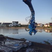 China Hitachi-Mounted Pile Hammer: Efficient Vibro Driving for Cement Square Piles for sale