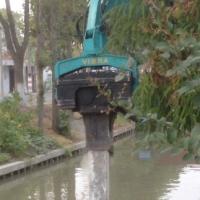 China Sheet Pile Driving Machine - Yellow Color & Excavator-Mounted Flexibility for sale