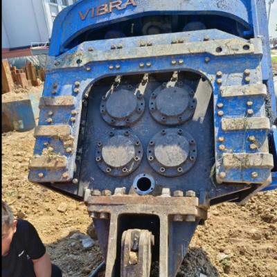 China Four Eccentric Pile Driver – 1064kN High Impact Energy Per Blow + High‑Flow Merging Valve Unit 700L/min For Heavy Construction for sale