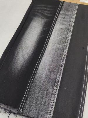 China 9.6oz BLACK/BLACK Yarn Cross Slub 75%Cotton High Stretch Denim Fabric With 10+10/16*55 Construction For Jeans for sale