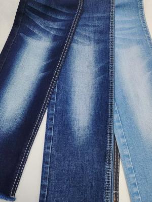 China Low Shrinkage Siro Yarn Cross Slub  75%Cotton Stretch Denim Fabric With 10+10/16*55 Construction For Jeans for sale