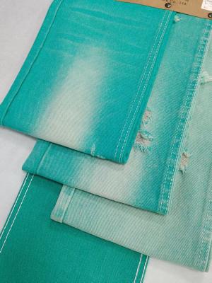 China Fancy APPLE GREEN Color Left Twill Style 10.6oz Denim Fabric With 10*7 Construction For Jeans for sale
