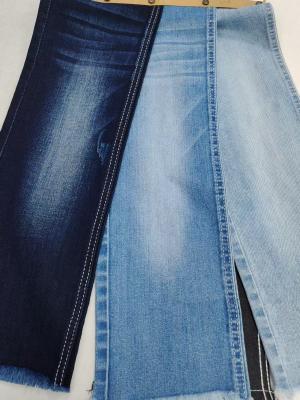 China 8.8oz Siro Yarn Warp Slub Dark Indigo Denim Fabric 10+10*16/55 Construction For Woman Jeans for sale