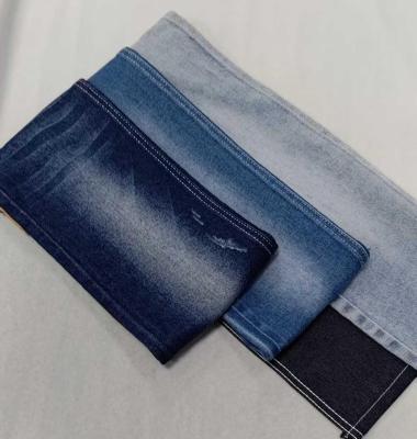 China 10oz Medium elastic  Dark indigo right twill with full width 180cm construction 8*10/40+75 Denim fabric  JSD3078 for jeans for sale