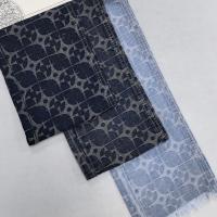 China 60% Cotton Four Leaf Star Blue Jacquard Knitted Middleweight Denim Fabric For Jeans 10.5 Oz for sale